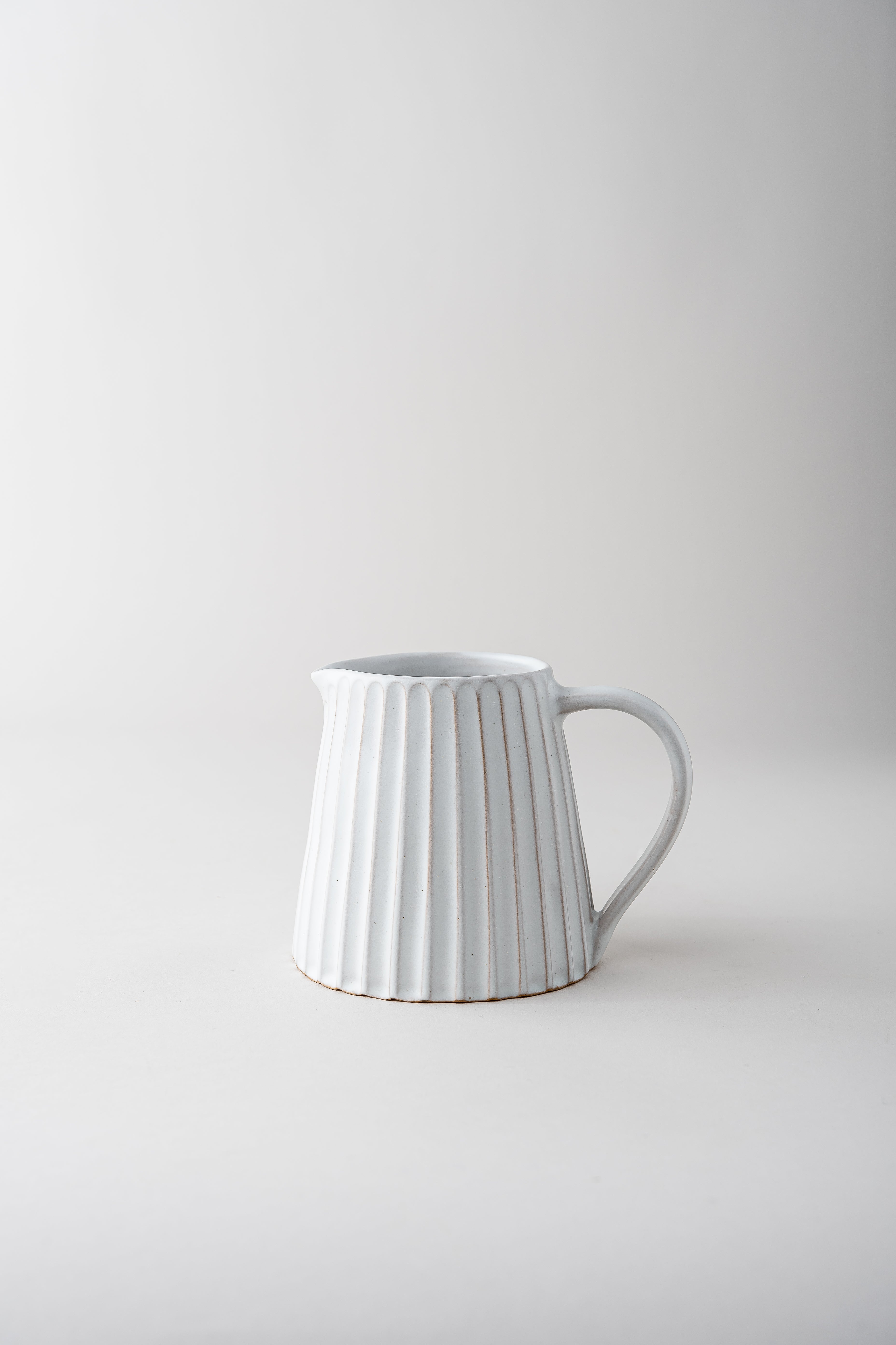 Rhea Pitcher – June Home Supply